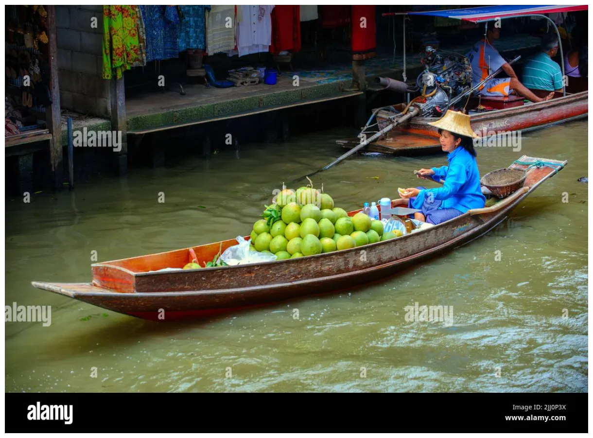 The Beauty of Damnoen Saduak Floating Market colorful boat fruit ...